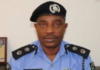 IG of Police, Solomon Arase stops officers from carrying bags for VIPs