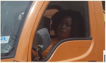 Strange! Female Refuse Truck Driver Spotted in Lagos (Photos)