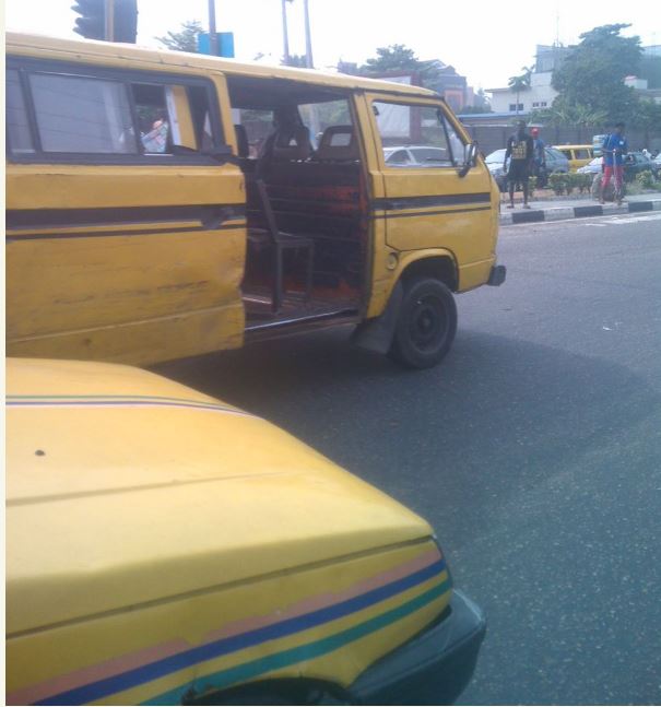 Hanging Bus Conductor Falls Off Speeding Danfo in Lagos (Photos)