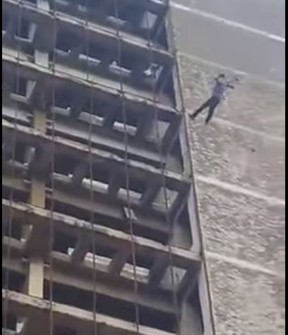 Person Jumping Off Building