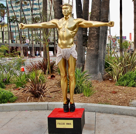 Blasphemy? Life-size Gold Statue of Kanye West Depicted as Jesus ...