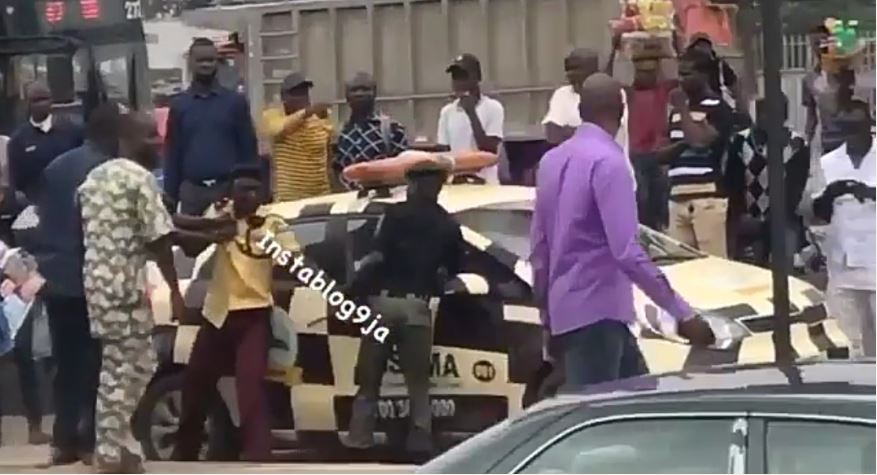 Maximum Beating: Policeman Attacks LASTMA Officials In Lagos (Photos+Video)