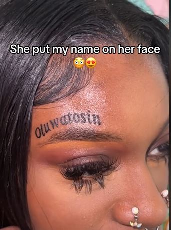 Lady Tattoos Boyfriend’s Name On Her Face (Video)