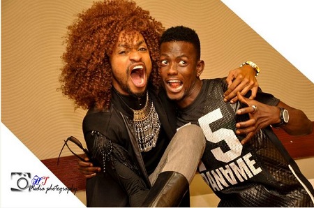 Nigerian Actor, Mr Latin Kisses Denrele's Shoes at an Event in Abeokuta